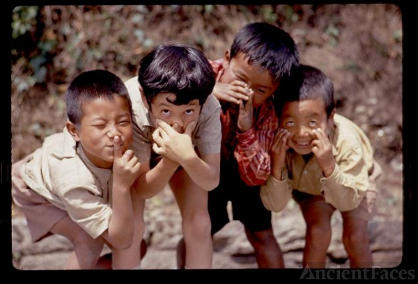 [Prince Palden (second from left) making silly faces with...