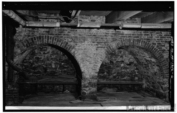6. BASEMENT OF FRONT HOUSE, NORTH WALL BRICK ARCHES...