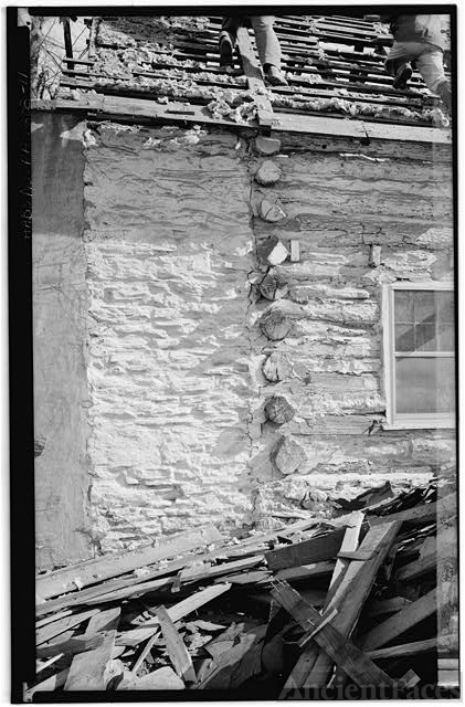 11. RUBBLE WALL, LOG CONSTRUCTION, AND EAVE - Lawrence...