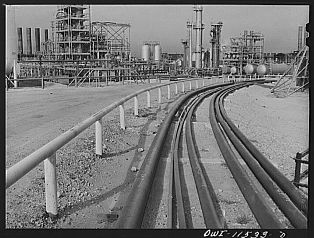 Borger, Texas. Pipelines leading from the gasoline plant...