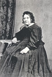 Kind-faced English Matron seated