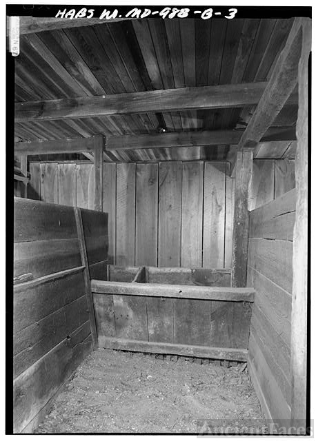 3. INTERIOR VIEW OF FEED TROUGH OF BARN STALL - Coffren...