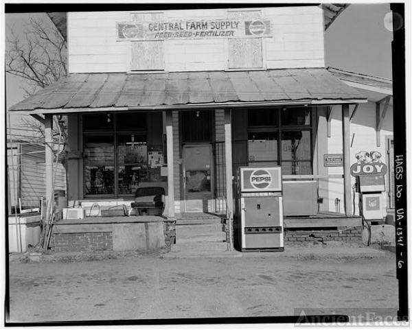 6. Detail view of the porch and storefront, looking...