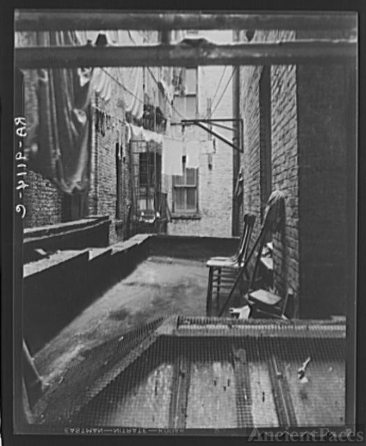 Out of rear window tenement dwelling of Mr. and Mrs....