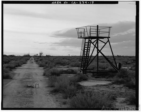 17. LINE OF 12-FOOT CAMERA TOWERS WITH VIEWING PLATFORMS....