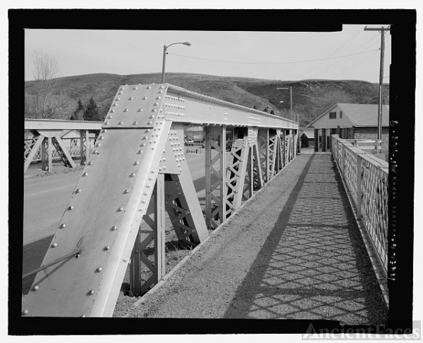 Detail of sidewalk, truss, and lattice guardrail; view to...
