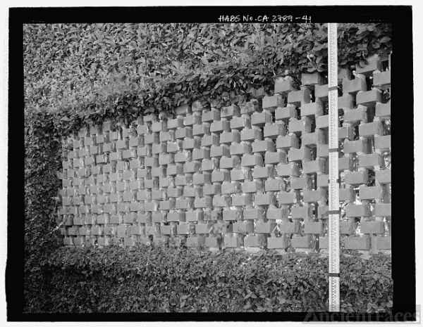 Exterior, brick wall screen between driveway and Faring...