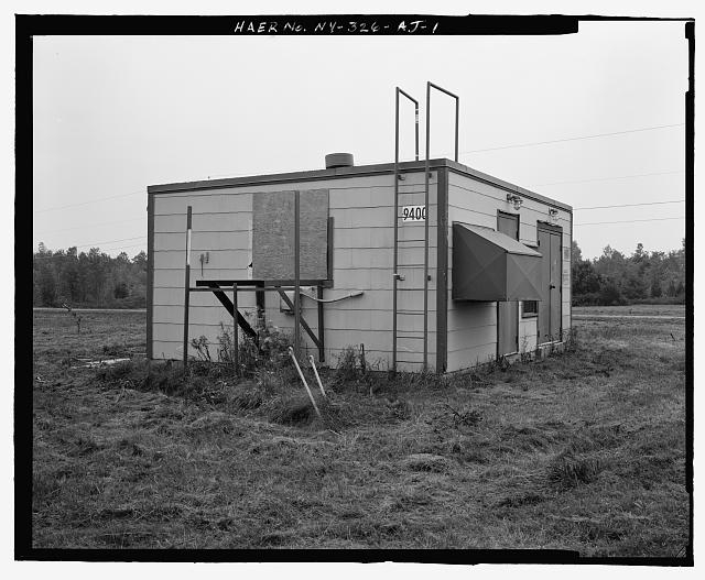 WEST (FRONT) AND NORTH (SIDE) ELEVATIONS OF BUILDING....