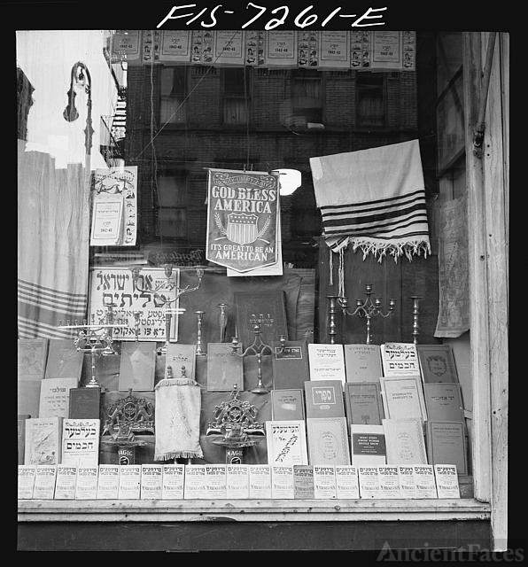 New York, New York. Window of a Jewish religious shop on...