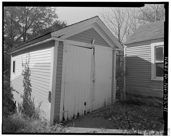 11. North (front) and east elevations of garage. View...