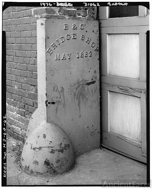 62. CAST-IRON WALL BOLSTER MARKED 'B&O BRIDGE SHOP MAY...