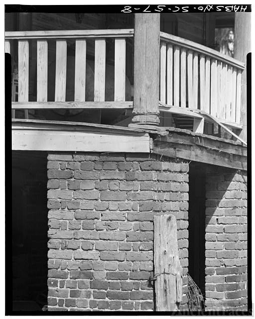 8. PORTICO COLUMN BASE AND BRICK PIER. BALUSTRADE IS NEW....