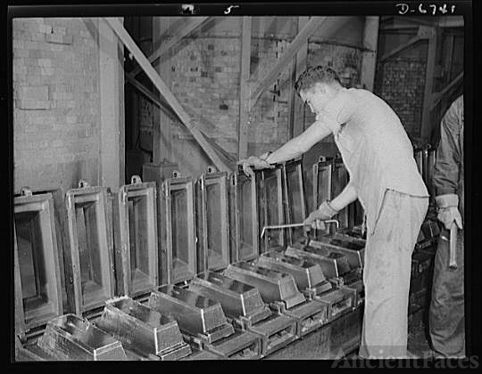 Production. Tin smelting. "Bars" of pure tin are trimmed...