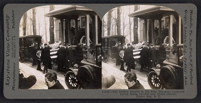 The casket, draped in the flag Theodore Roosevelt loved,...