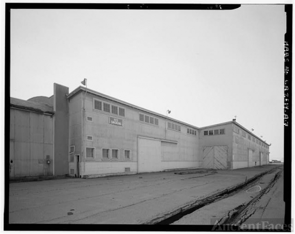 7. EXTERIOR OBLIQUE VIEW OF EASTERN PORTION OF BUILDING...