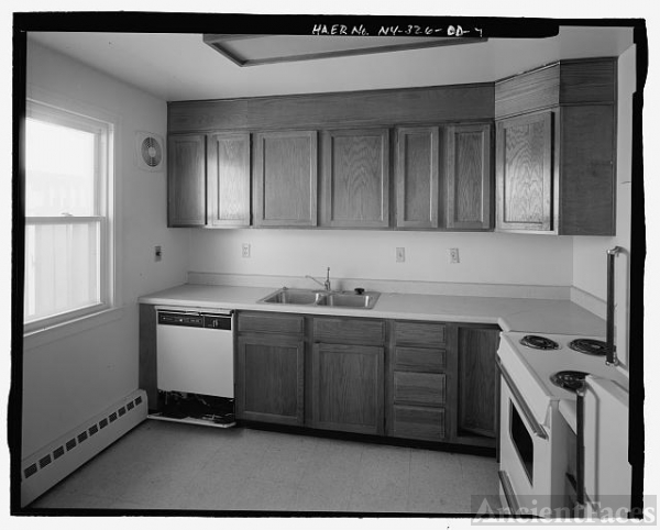 INTERIOR OF FIRST FLOOR KITCHEN IN UNIT B. view TO...