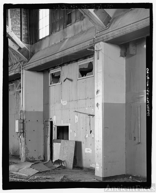 20. Detail showing two concrete columns and concrete...