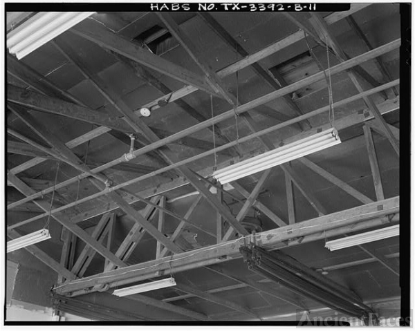 11. Interior detail showing truss structure at shop area...