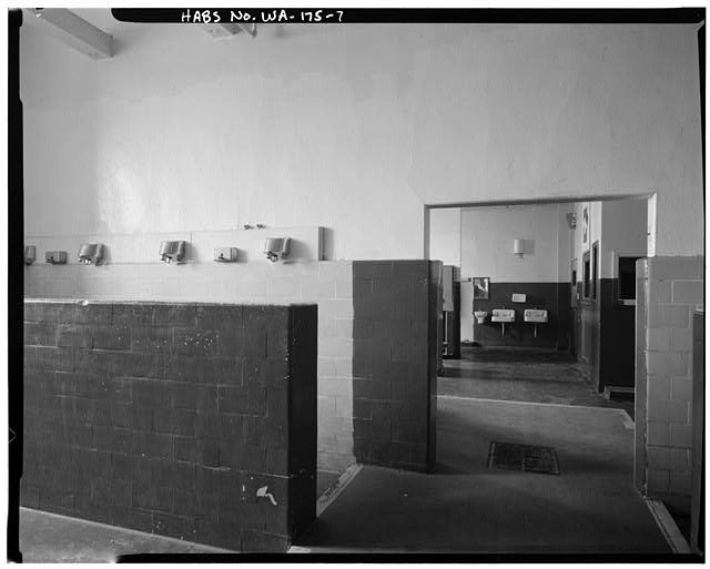 7. BOYS SHOWER AND LOCKER ROOM, BASEMENT LEVEL ON WEST...