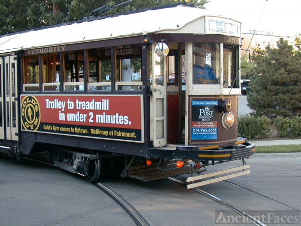 SCHMUDE GUEST OPERATES A TROLLEY ((streetcar//tram)) IN DALLAS, TEXAS