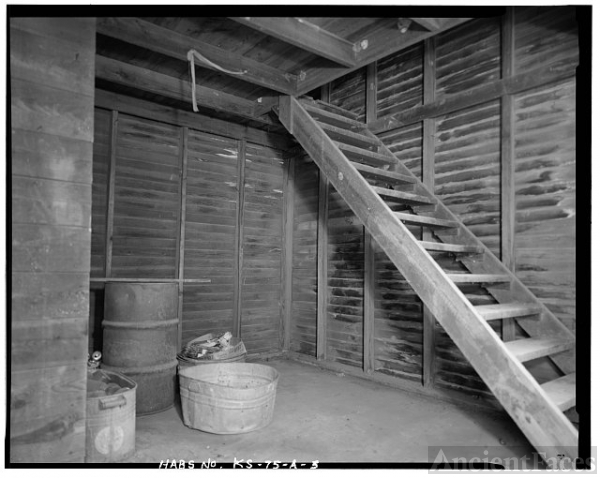 5. Interior of smokehouse first story, looking southeast,...