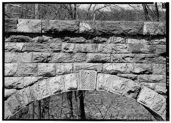 5. TOP OF ARCH AND VIADUCT. NOTE THAT STONES OF ARCH HAVE...