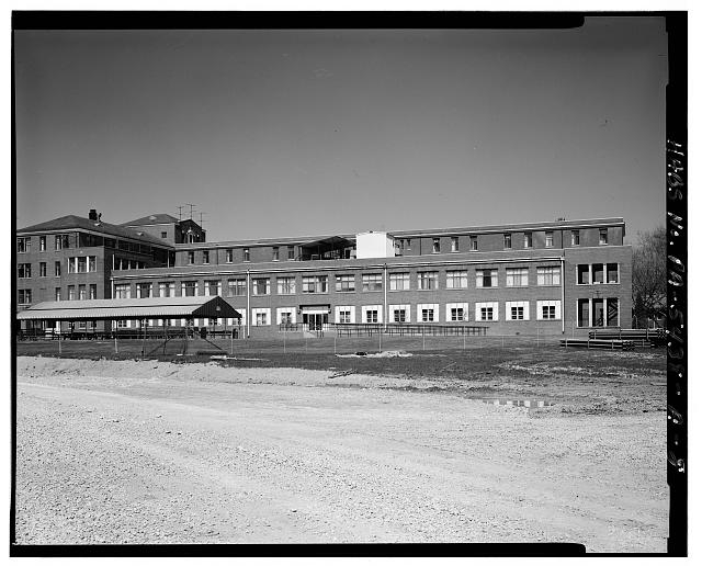 8. DETAIL VIEW OF INFIRMARY BUILDING SHOWING SOUTH FACADE...