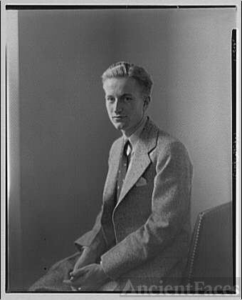 Portrait photographs. Young man, seated, three quarters view