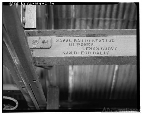 14. FACILITY IDENTIFICATION STENCILED ON ROOF BEAM,...