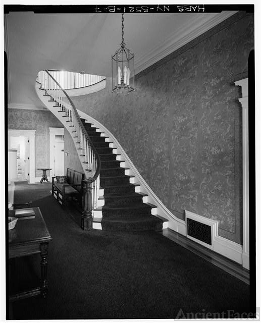 7. FIRST FLOOR HALL AND STAIRWAY TO SECOND FLOOR; LOOKING...